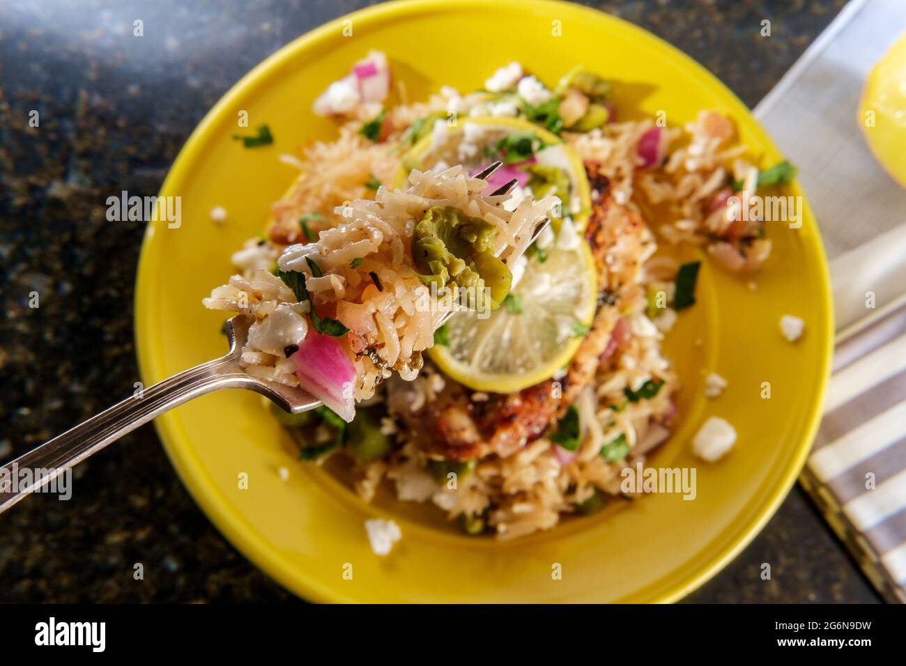 Greek skin-on bone-in crispy chicken thighs with rice and castelvetrano ...