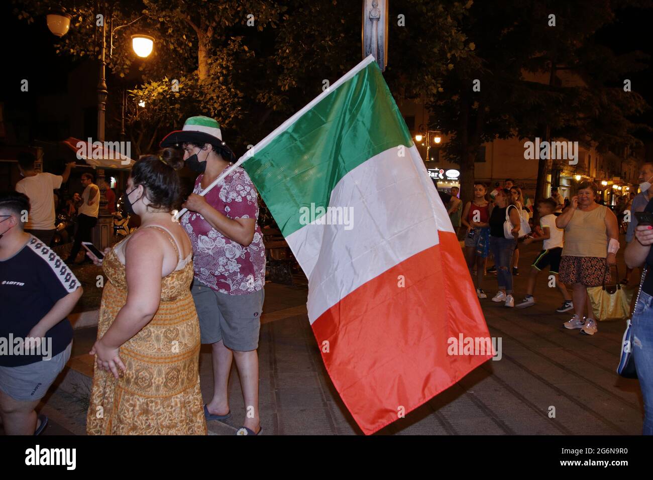 Pagani, Italy. 07th July, 2021. Fans in the street celebrate with smoke ...