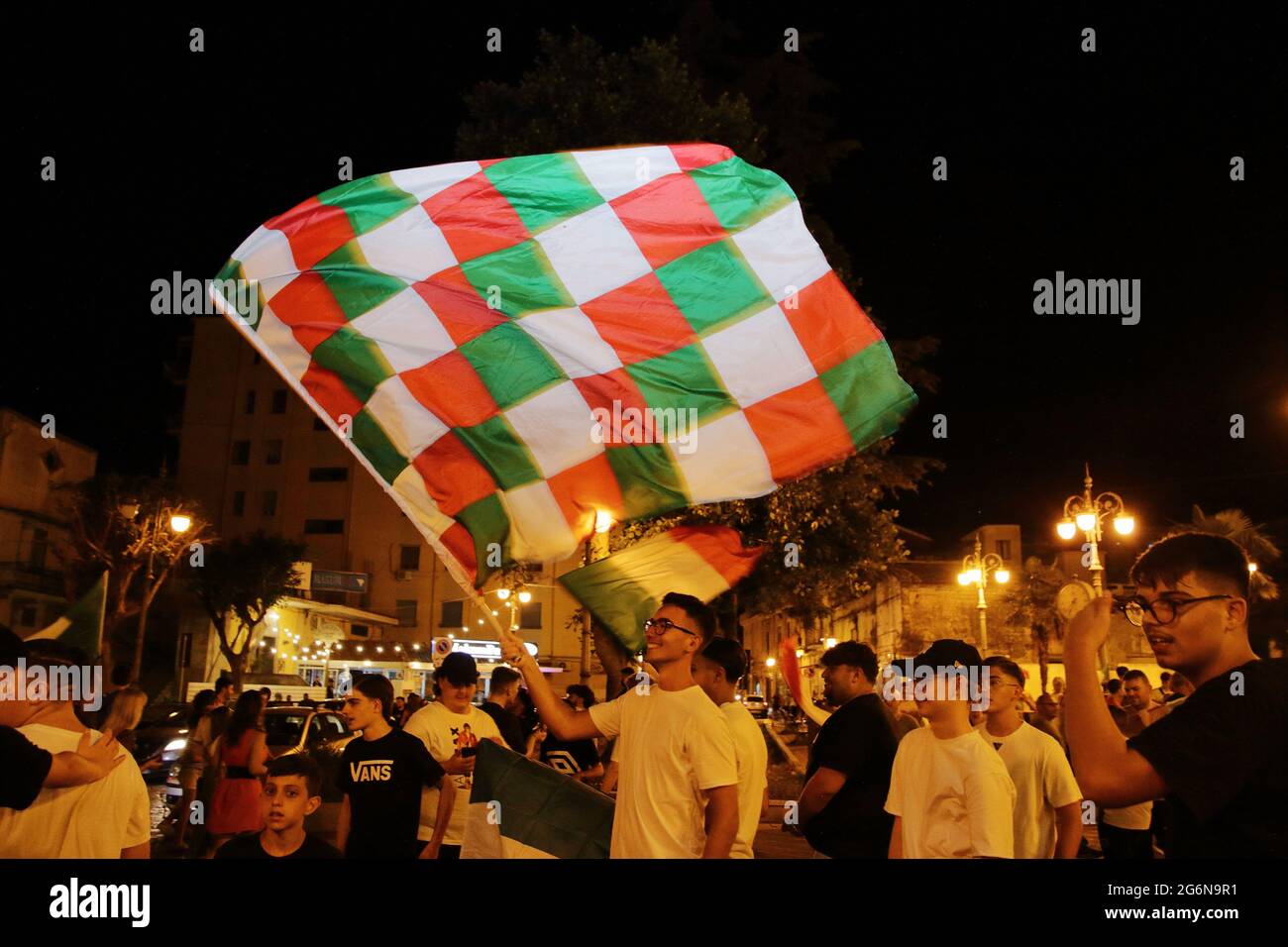 Pagani, Italy. 06th July, 2021. Fans in the street celebrate with smoke ...