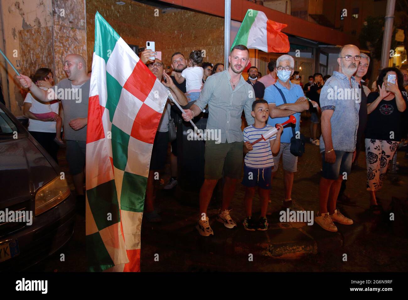 Pagani, Italy. 07th July, 2021. Fans in the street celebrate with smoke ...