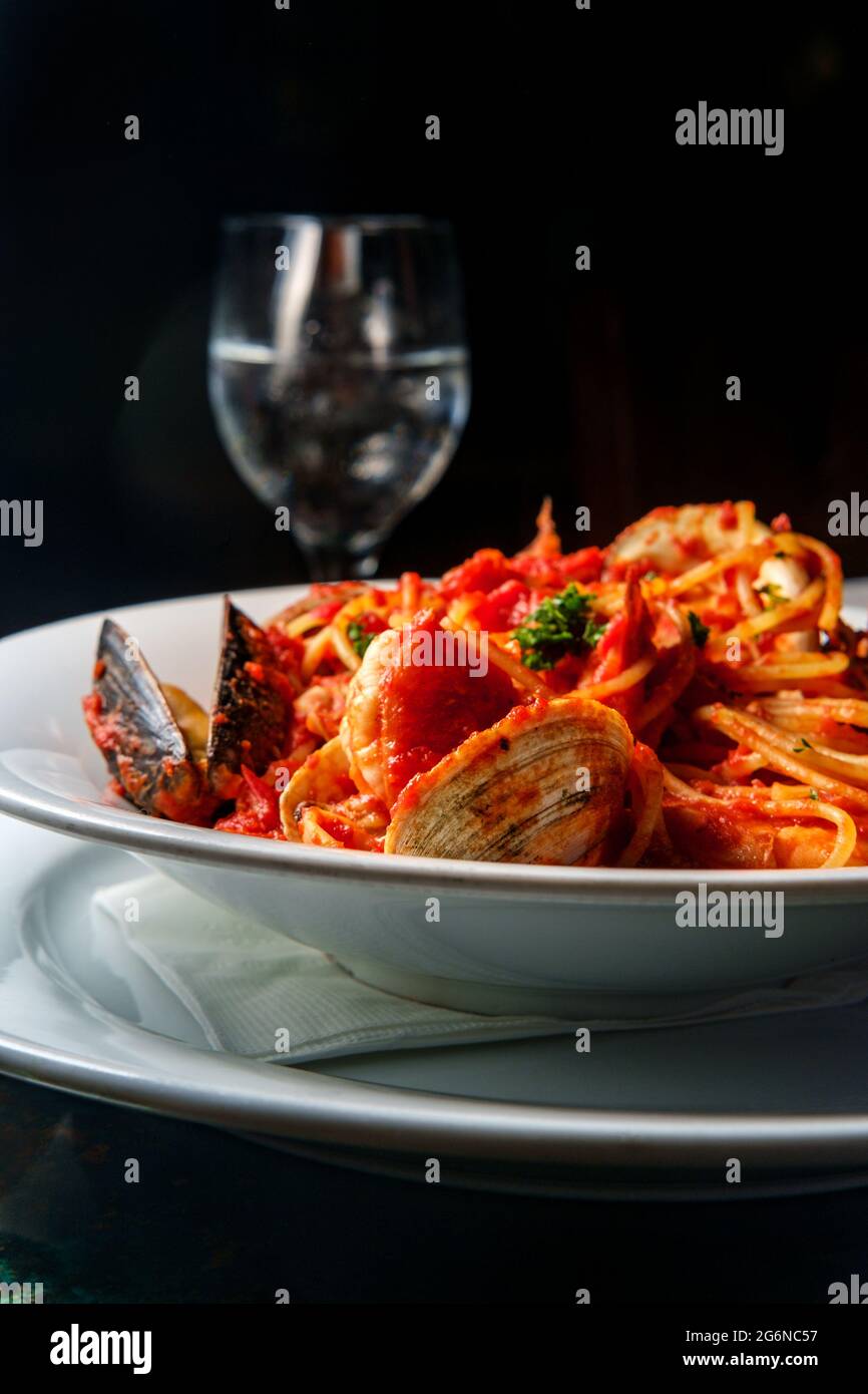 Italian seafood spaghetti pasta pescatore with mussels clams shrimp and ...