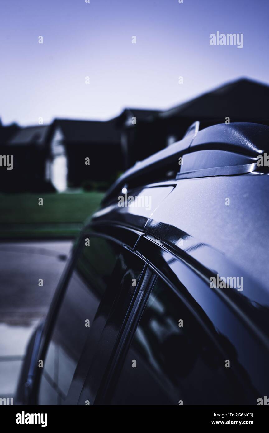 Narrow selective focus on the roof rack with cross bars installed on ...