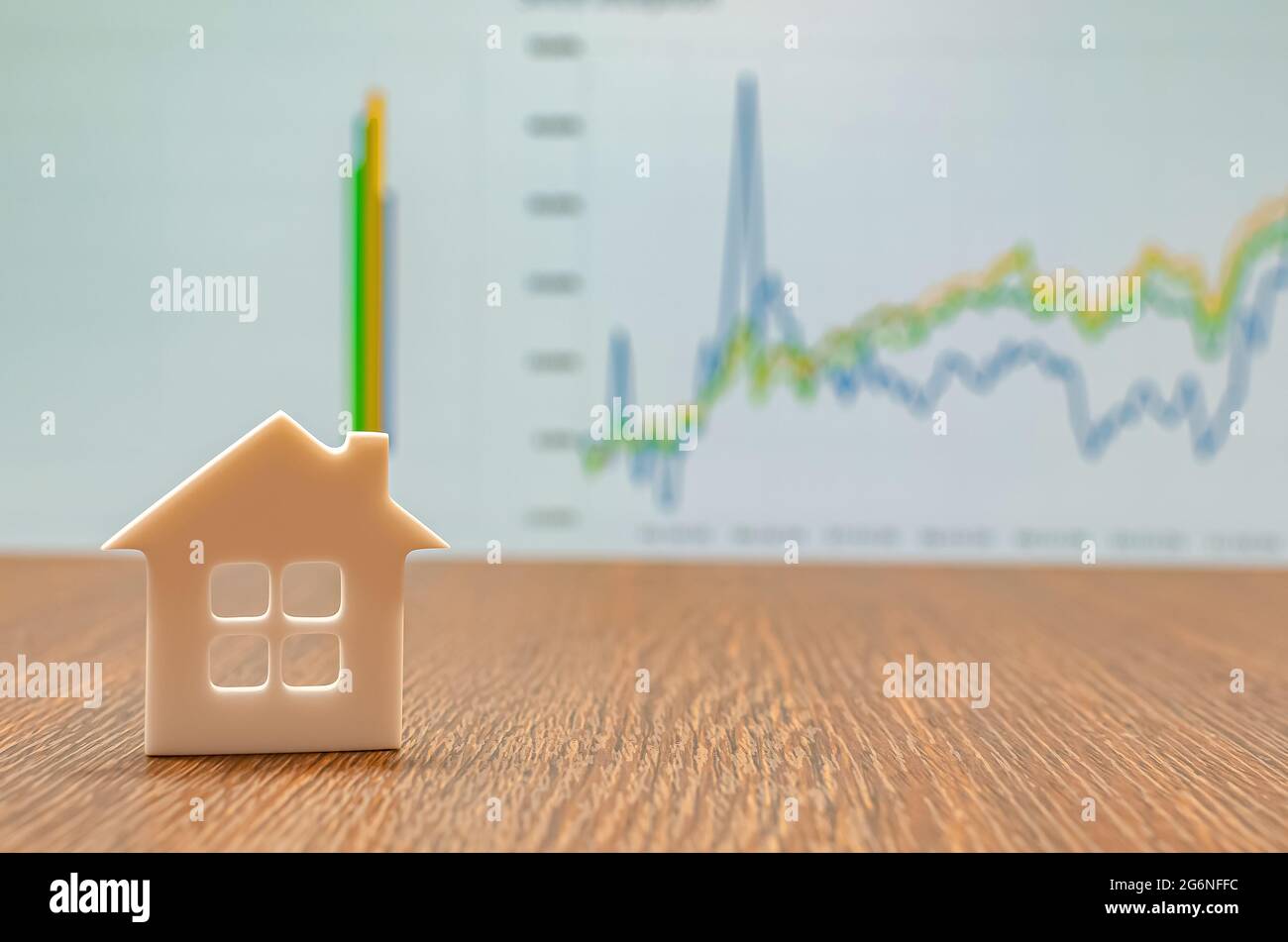 Real estate market, growth chart in 2021 with houses, copy space ...