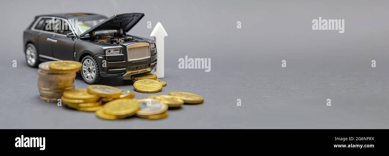 Rising prices for auto parts. On a black background, there is a model ...