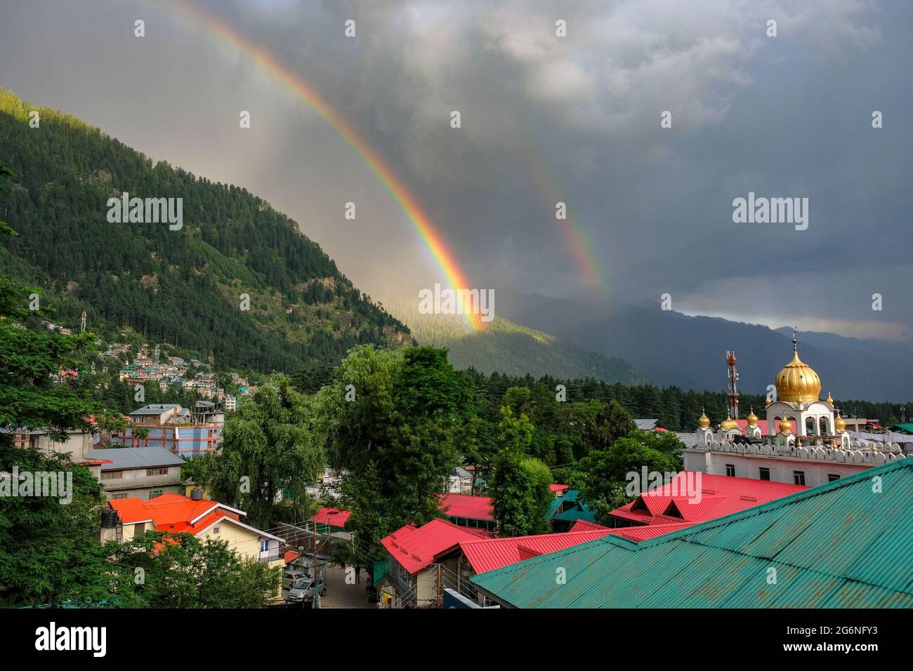 Manali, India - June 2021: Views of Manali with a rainbow in the ...