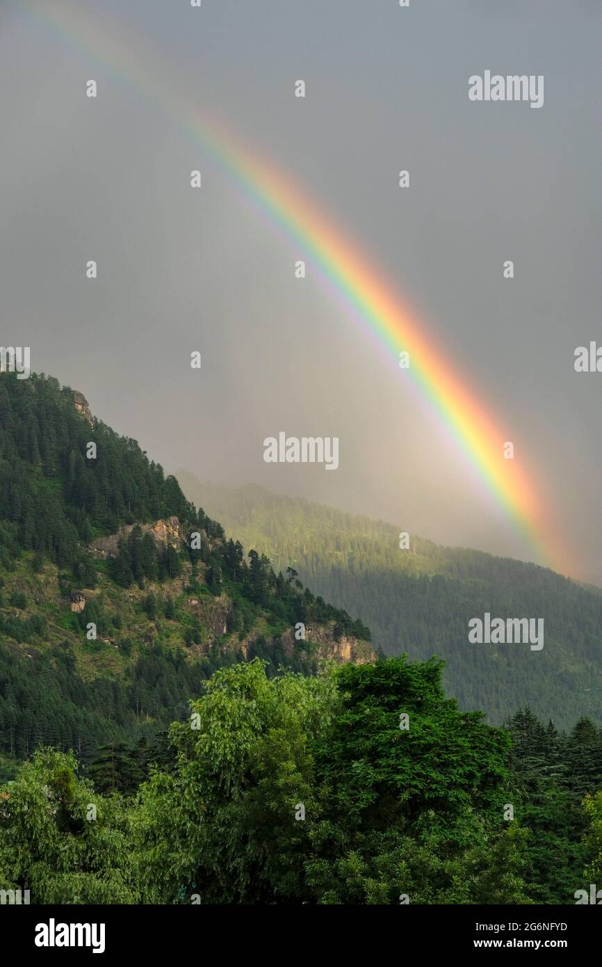 Views of the mountains in Manali with a rainbow in the background in ...