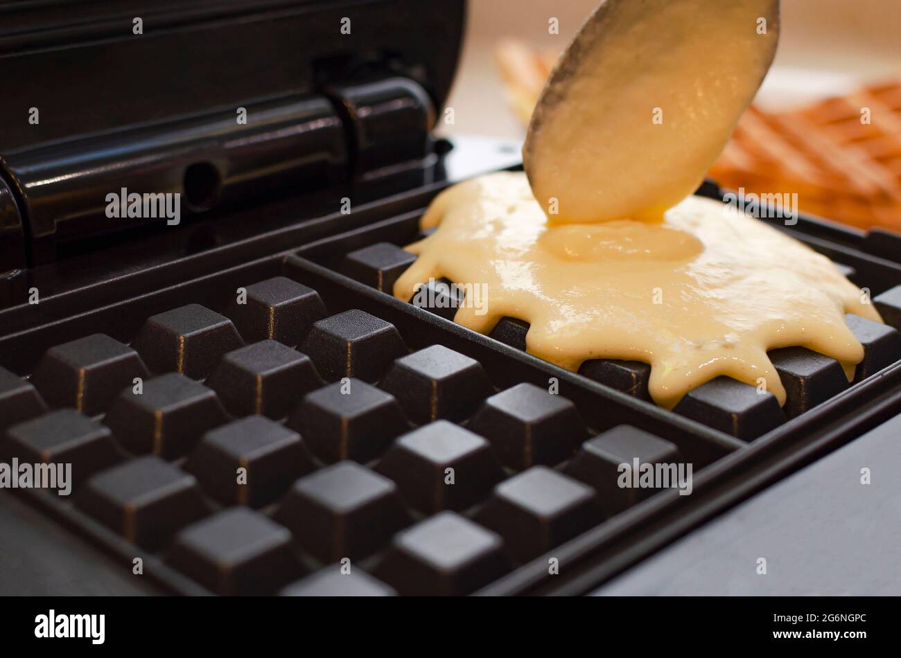 Modern waffle maker with ingredients, homemade Belgian waffles Stock ...