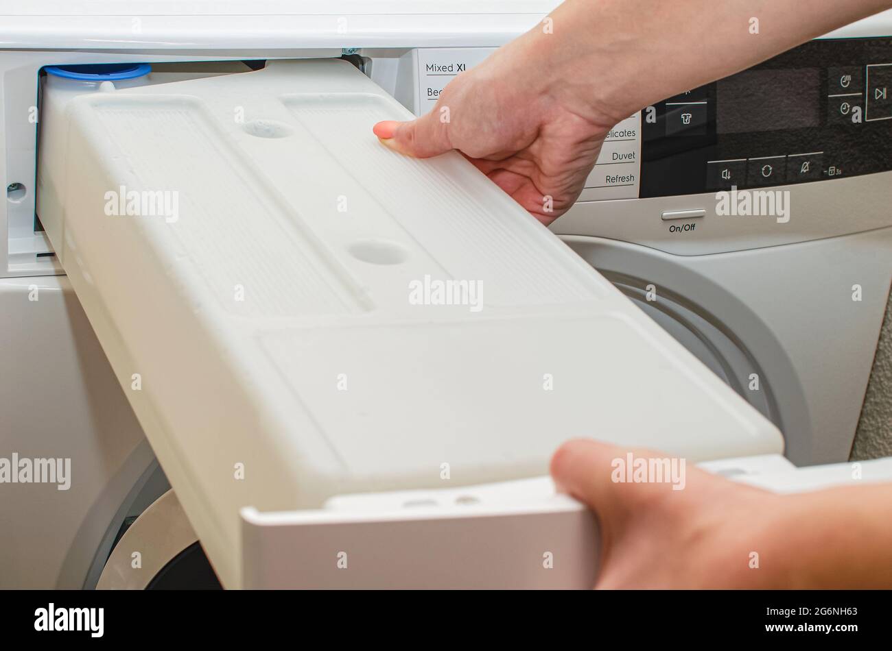 Dehumidifier drying clothes hi-res stock photography and images - Alamy