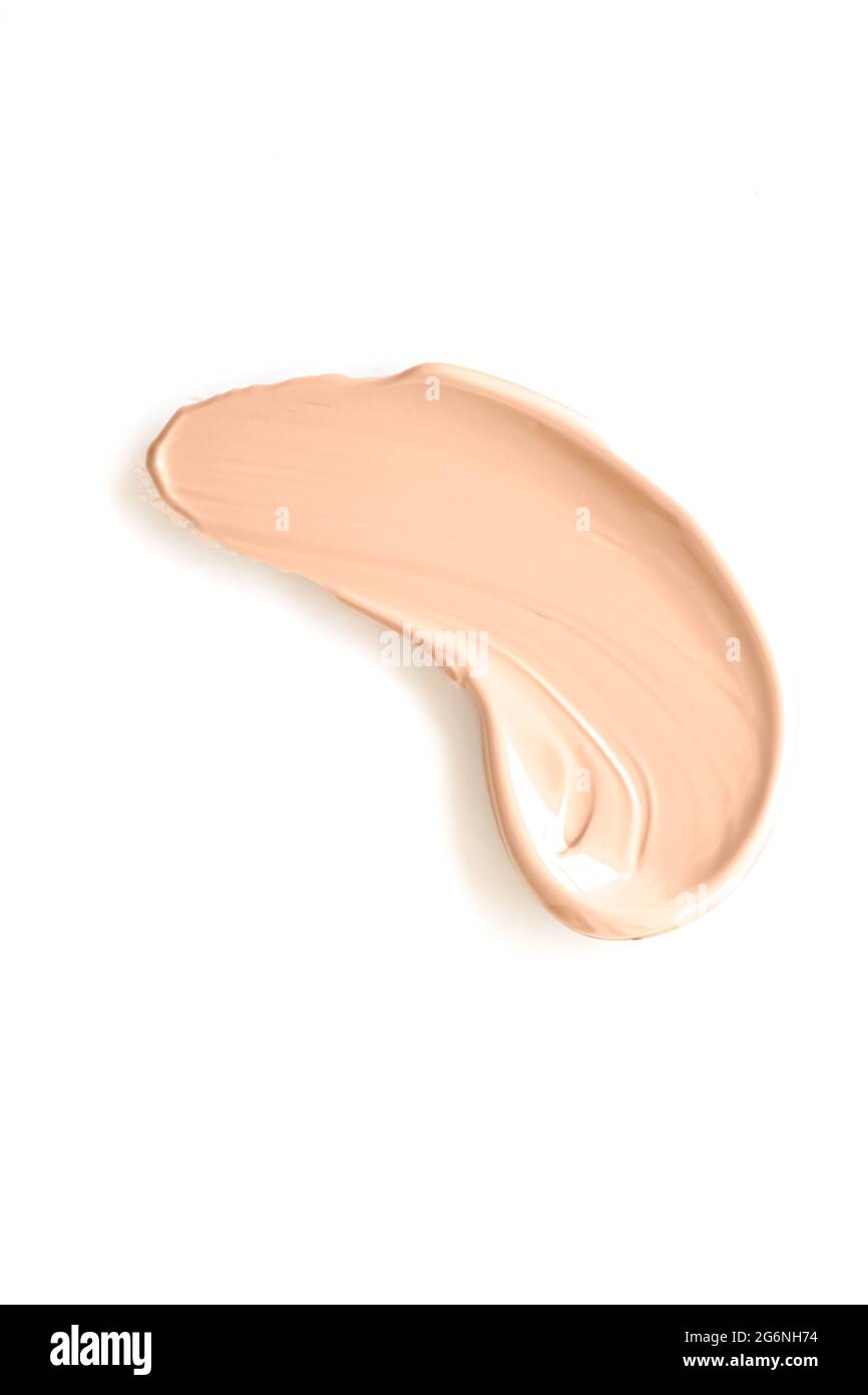 Beige beauty cosmetic texture isolated on white background, smudged ...
