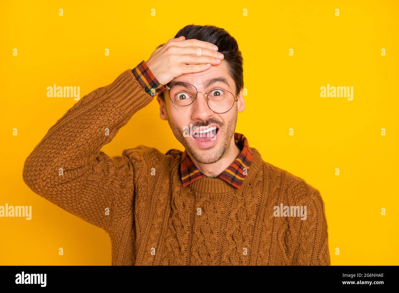 Photo of crazy funny guy palm forehead open mouth wear eyeglasses brown ...