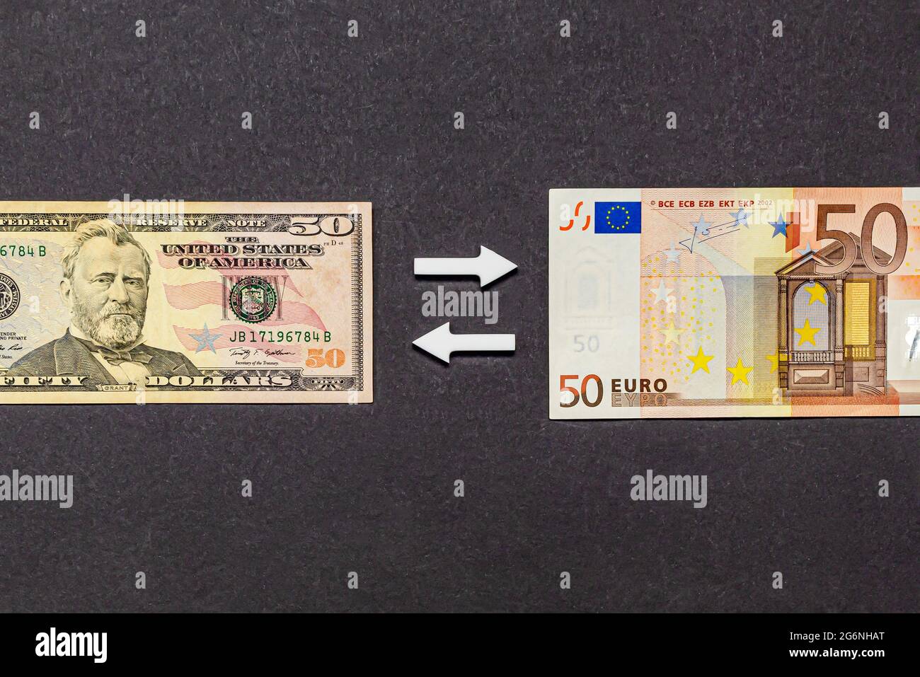 currency exchange the ratio of the dollar to the euro two currencies on a black background. Copy space Stock Photo Alamy