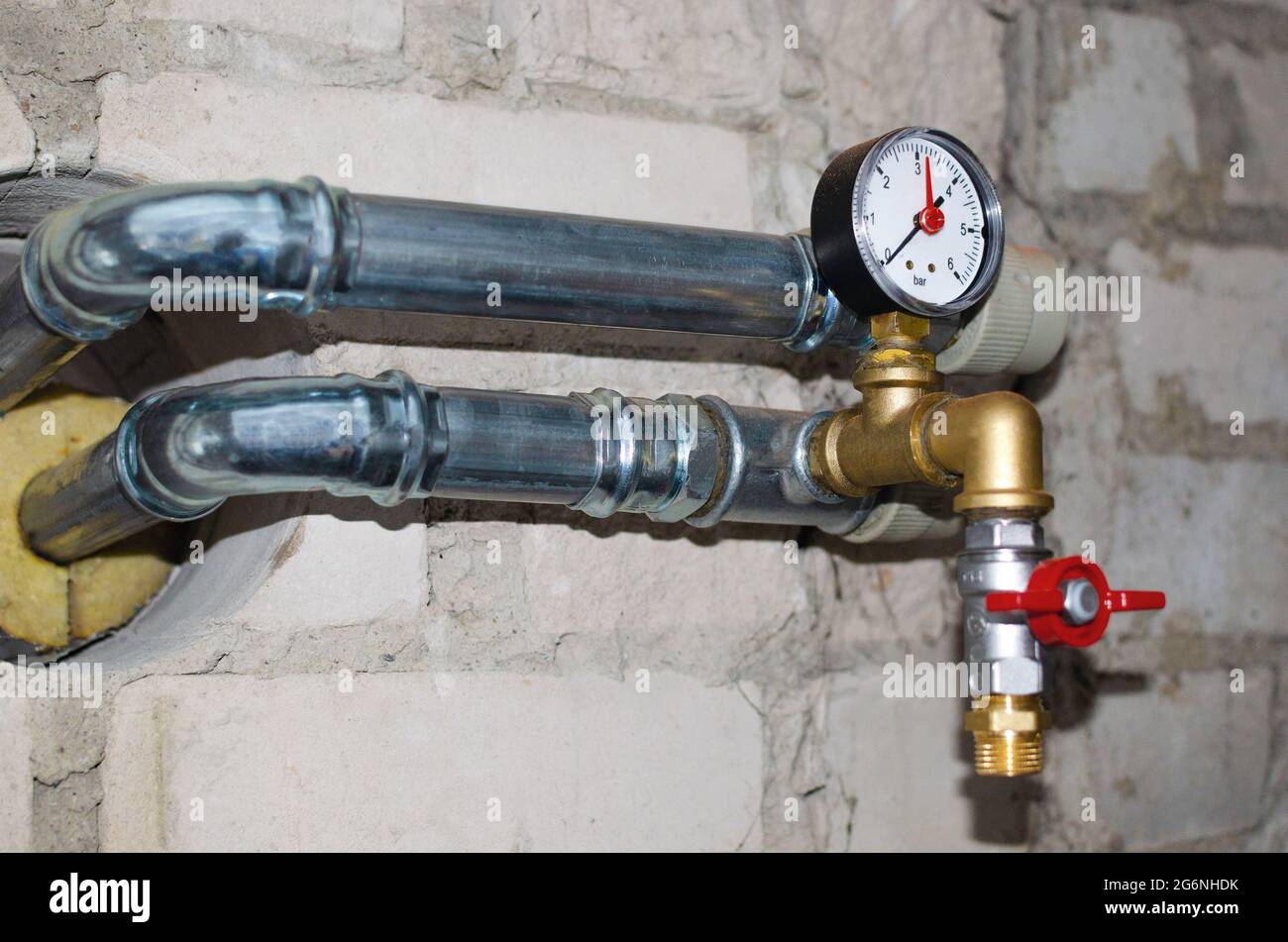 Industrial heating system. Pressure sensor on the hot water pressure ...