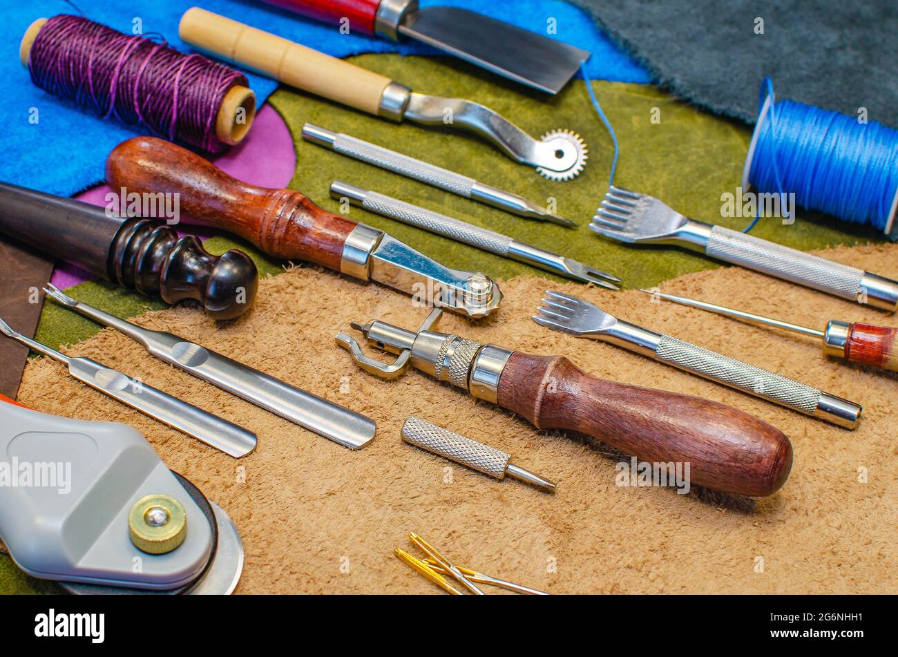 Leather shoemaker concept. Leather business, the tool is spread out on ...