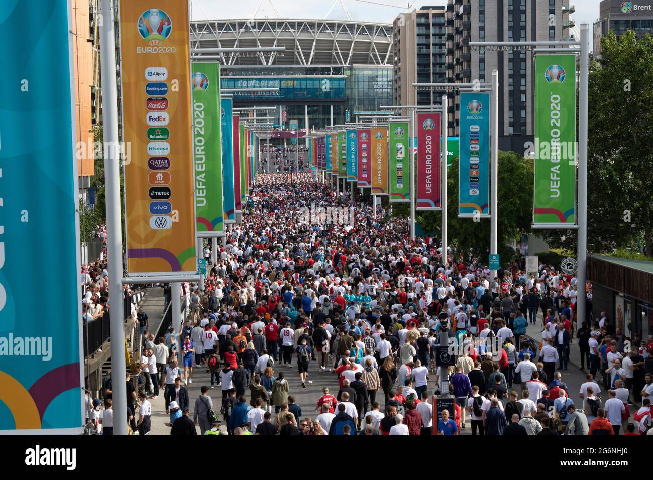 London, UK England and Denmark fans arriving at Wembley Stadium ahead ...