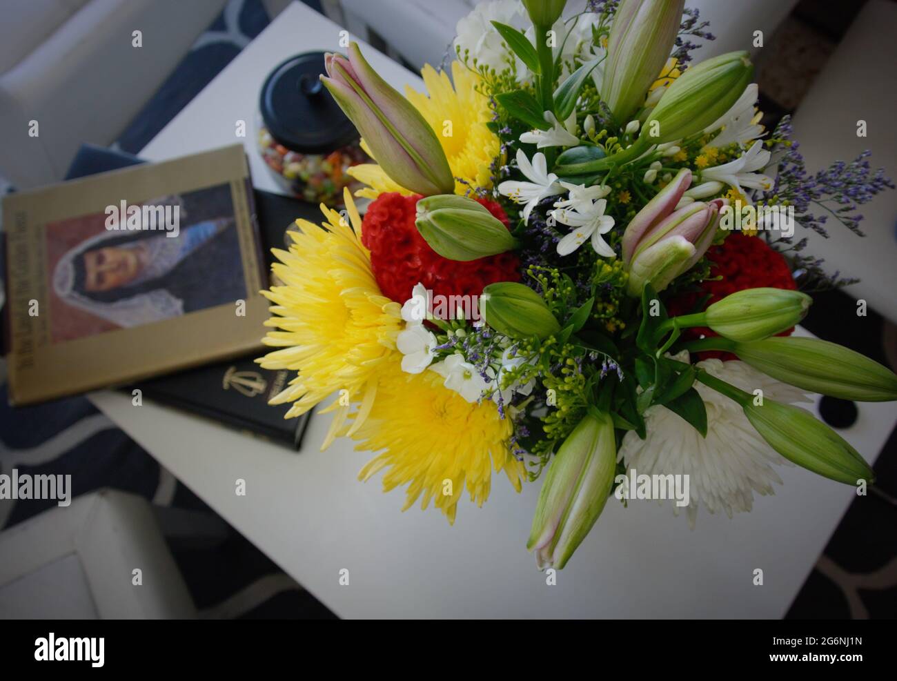 Bunch of Flowers with books in the book ground Stock Photo - Alamy