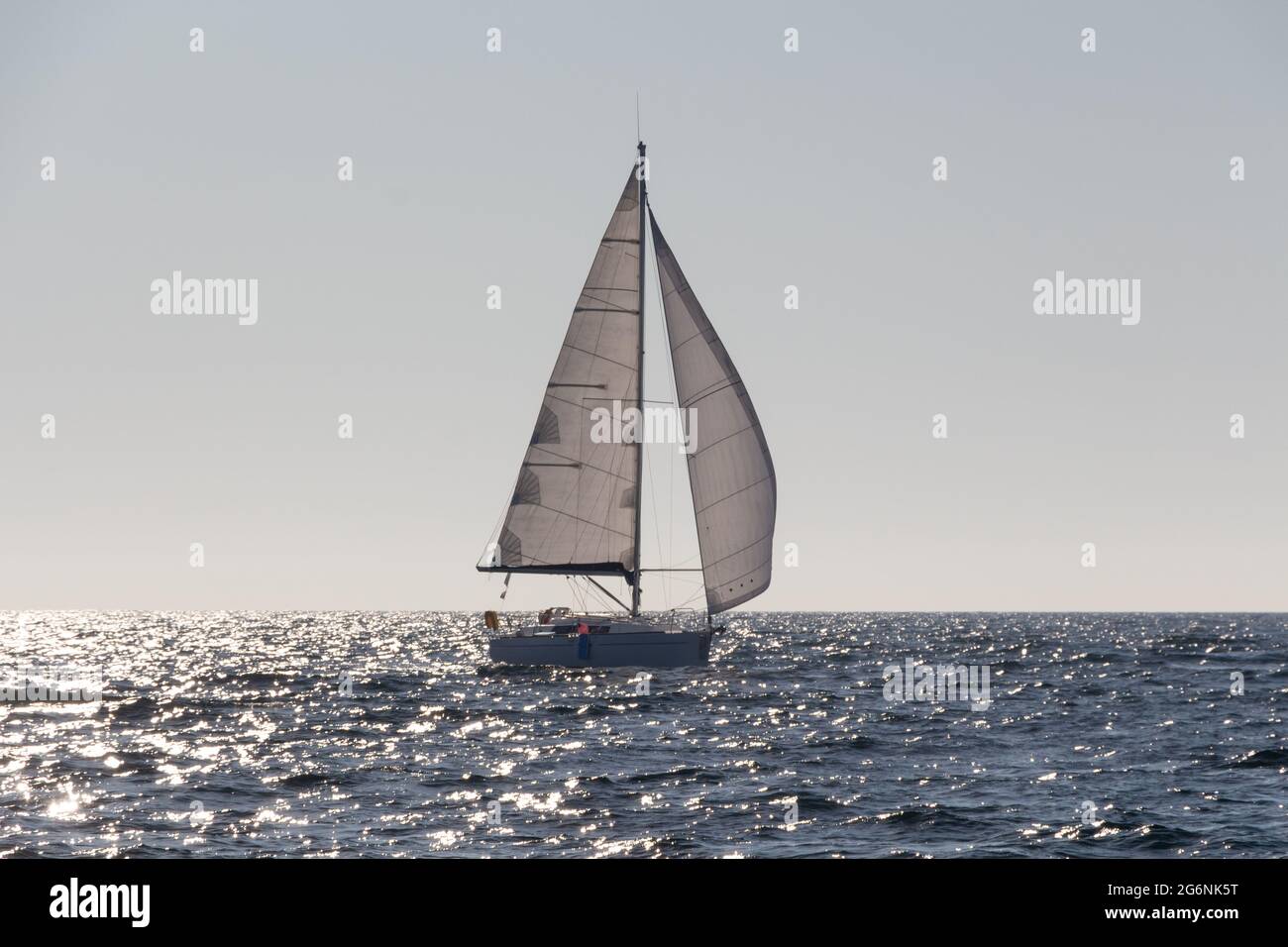 Sailboat at sunrise during autumn in Brittany Stock Photo - Alamy