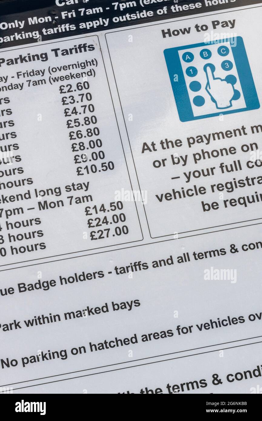 signage and information on a parking charges notice in a public car ...