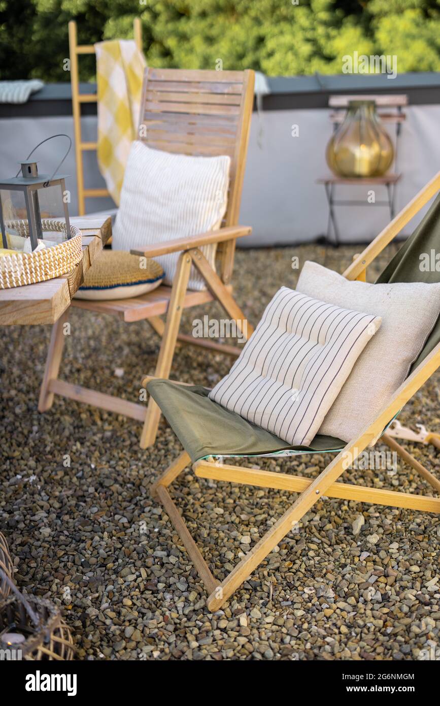 Beautiful wooden chairs on a rooftop Stock Photo - Alamy