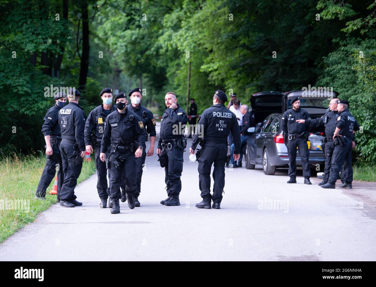 Munich, Germany. 07th July, 2021. Police officers investigate a crime ...