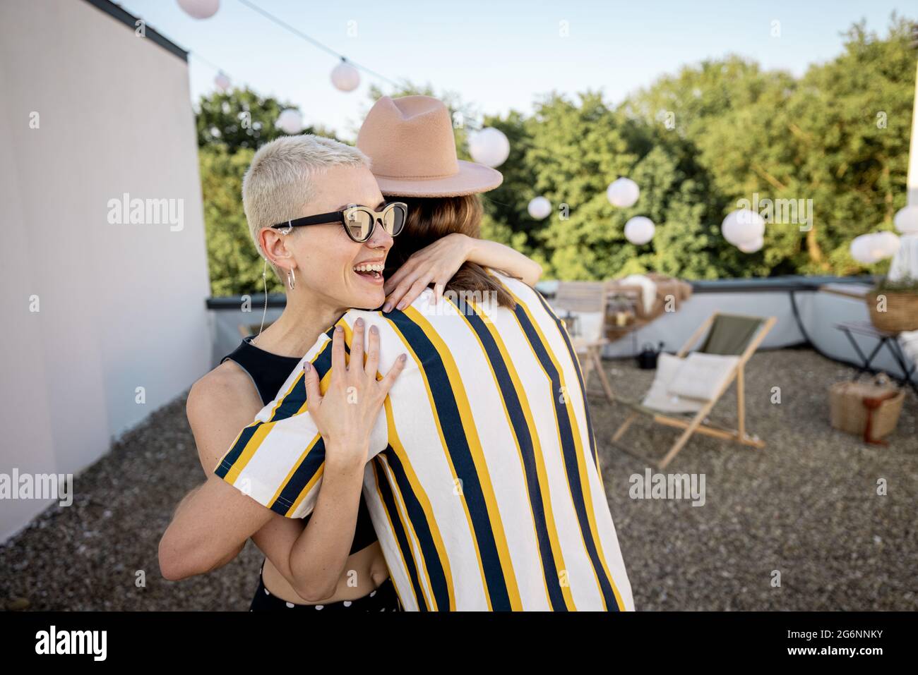 Greeting friends party hi-res stock photography and images - Alamy