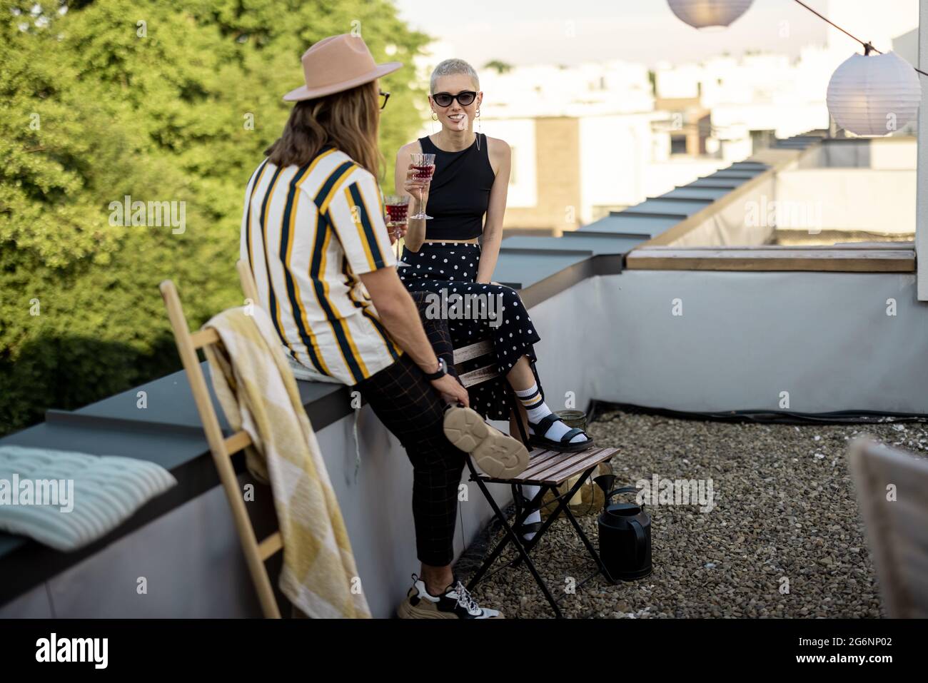 Two friends hanging out at picnic outdoors Stock Photo - Alamy Two friends hanging out at picnic outdoors Stock Photo - Alamy