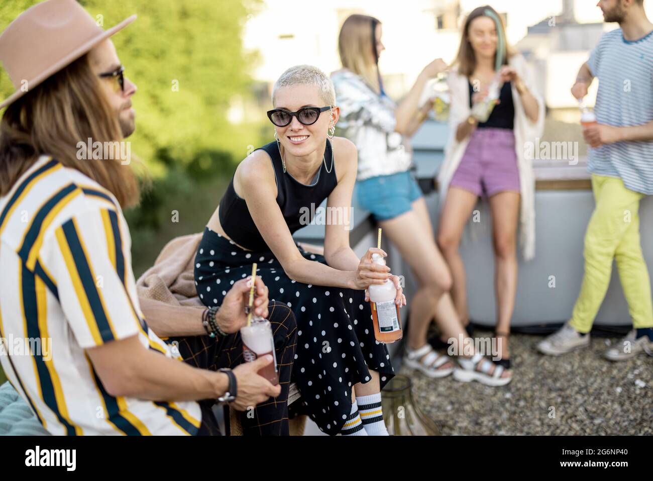 Two friends hanging out at picnic outdoors Stock Photo - Alamy