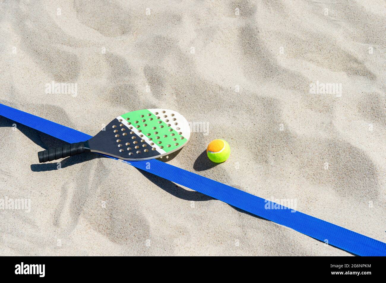 Racket and ball on the sandy beach. Summer sport concept Stock Photo ...