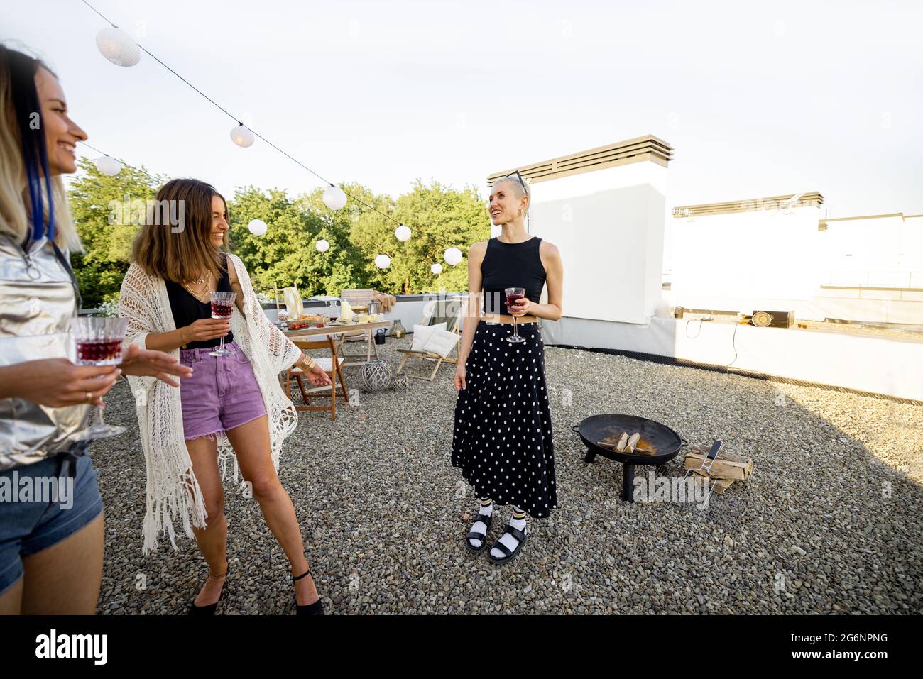 Stylish friends dancing at party outdoors Stock Photo - Alamy