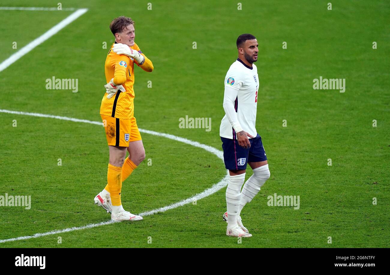 England goalkeeper Jordan Pickford and Kyle Walker react after ...