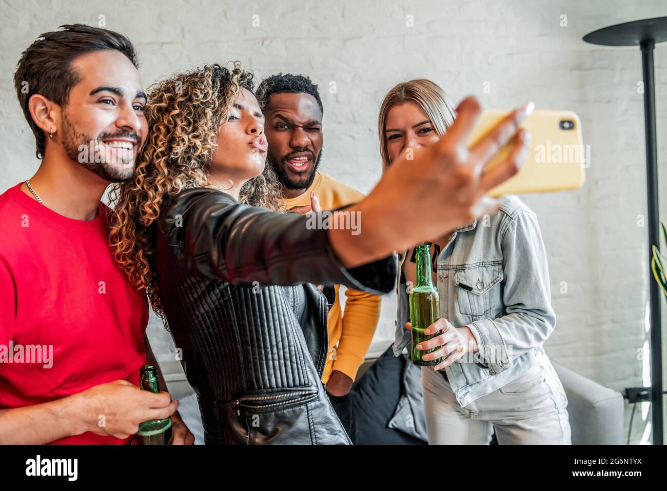Cheerful friends mobile phone hi-res stock photography and images - Alamy