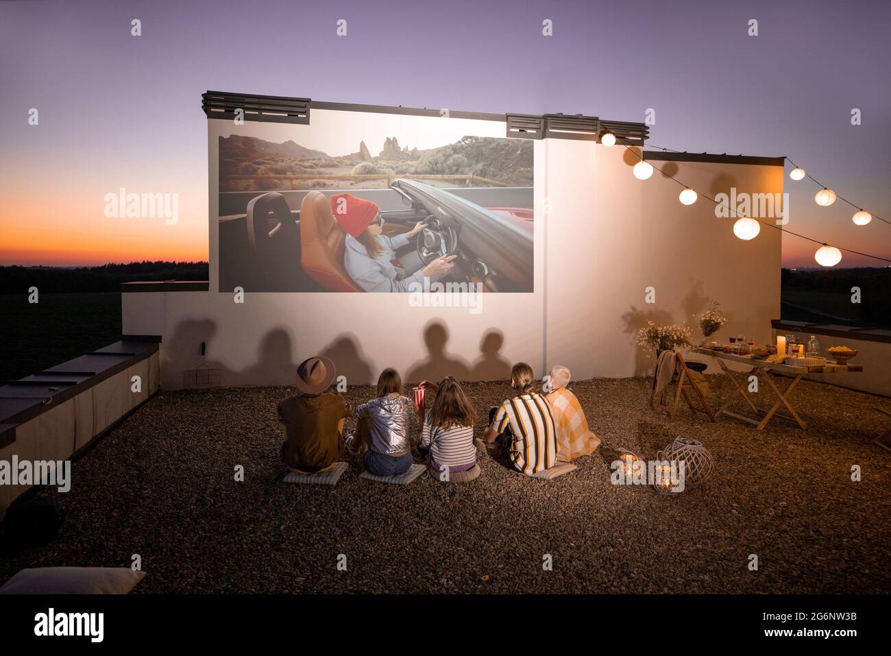 Watching movie theater screen hi-res stock photography and images - Alamy