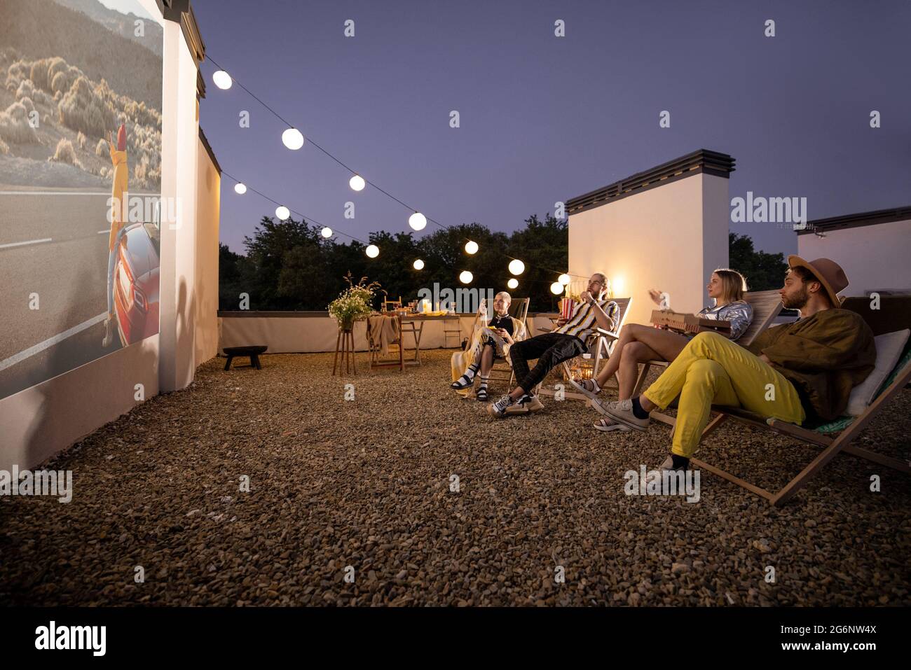 Watching movie theater screen hi-res stock photography and images - Alamy