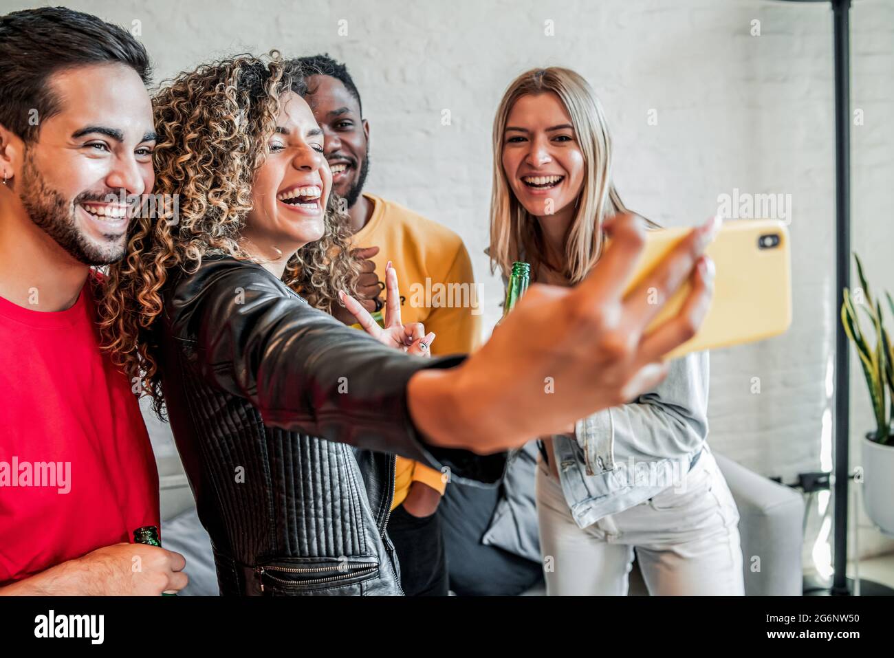 Cheerful friends mobile phone hi-res stock photography and images - Alamy