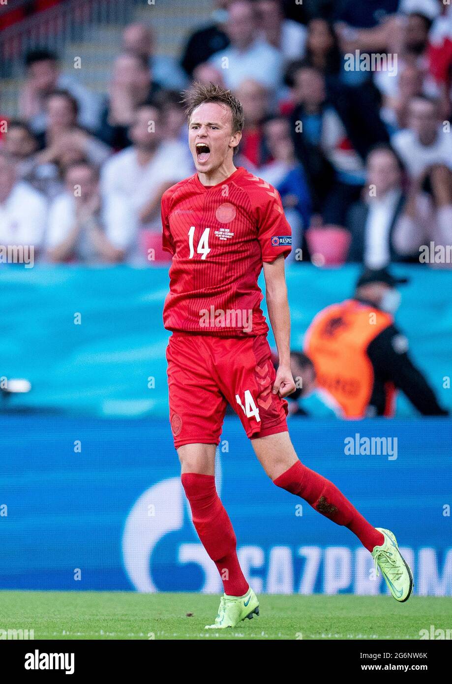 Denmark's Mikkel Damsgaard celebrates scoring their side's first goal ...