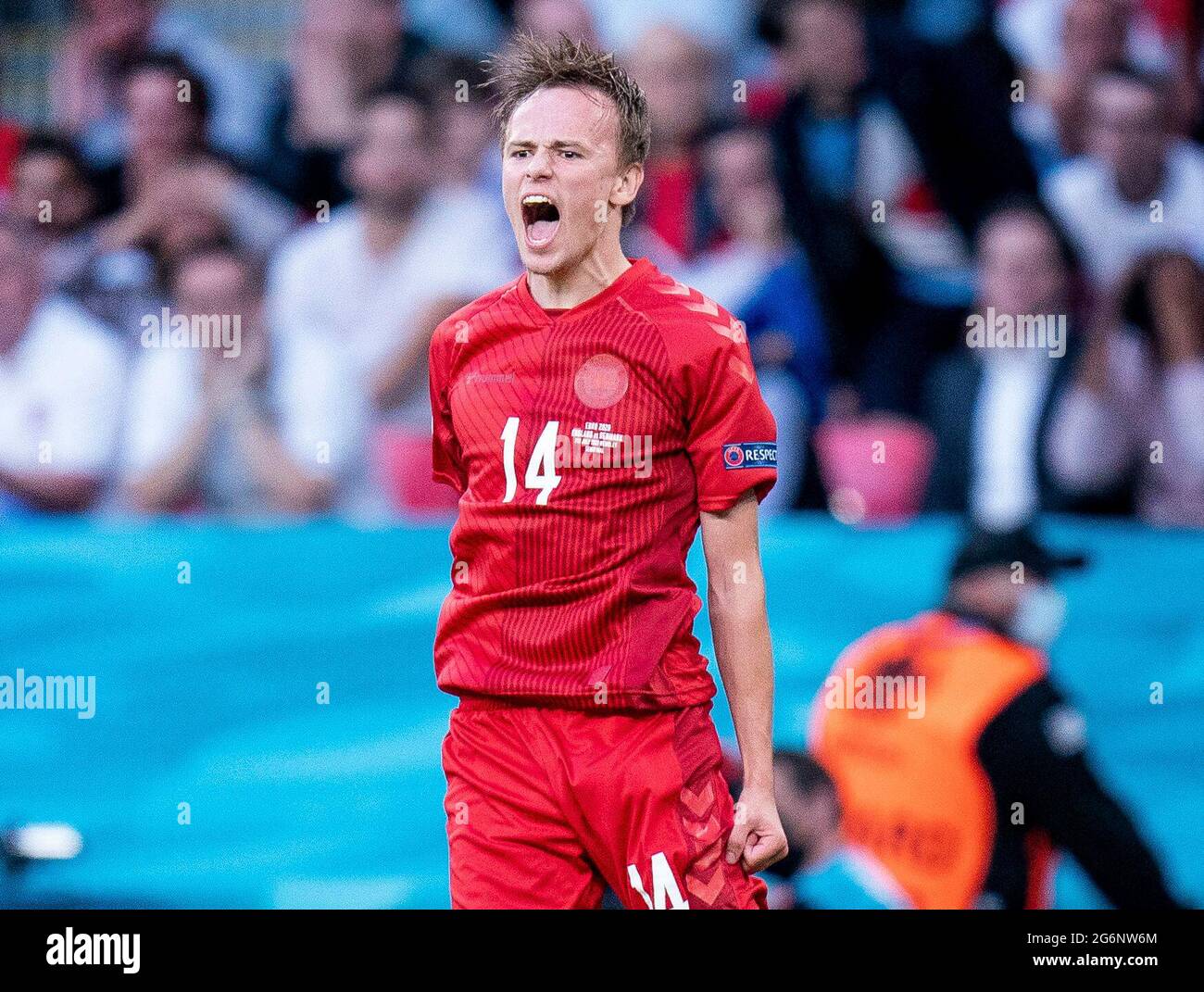 Denmark's Mikkel Damsgaard celebrates scoring their side's first goal ...