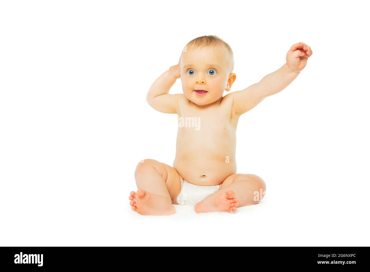 Baby girl in diaper isolated on white lift hands Stock Photo - Alamy