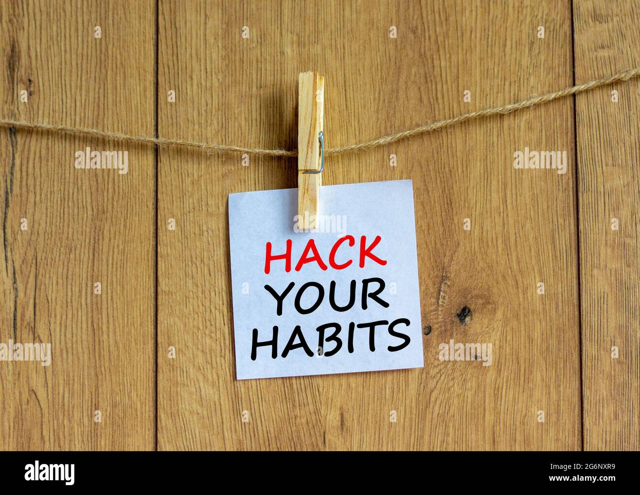 Hack your habits symbol. White paper with words 'Hack your habits ...