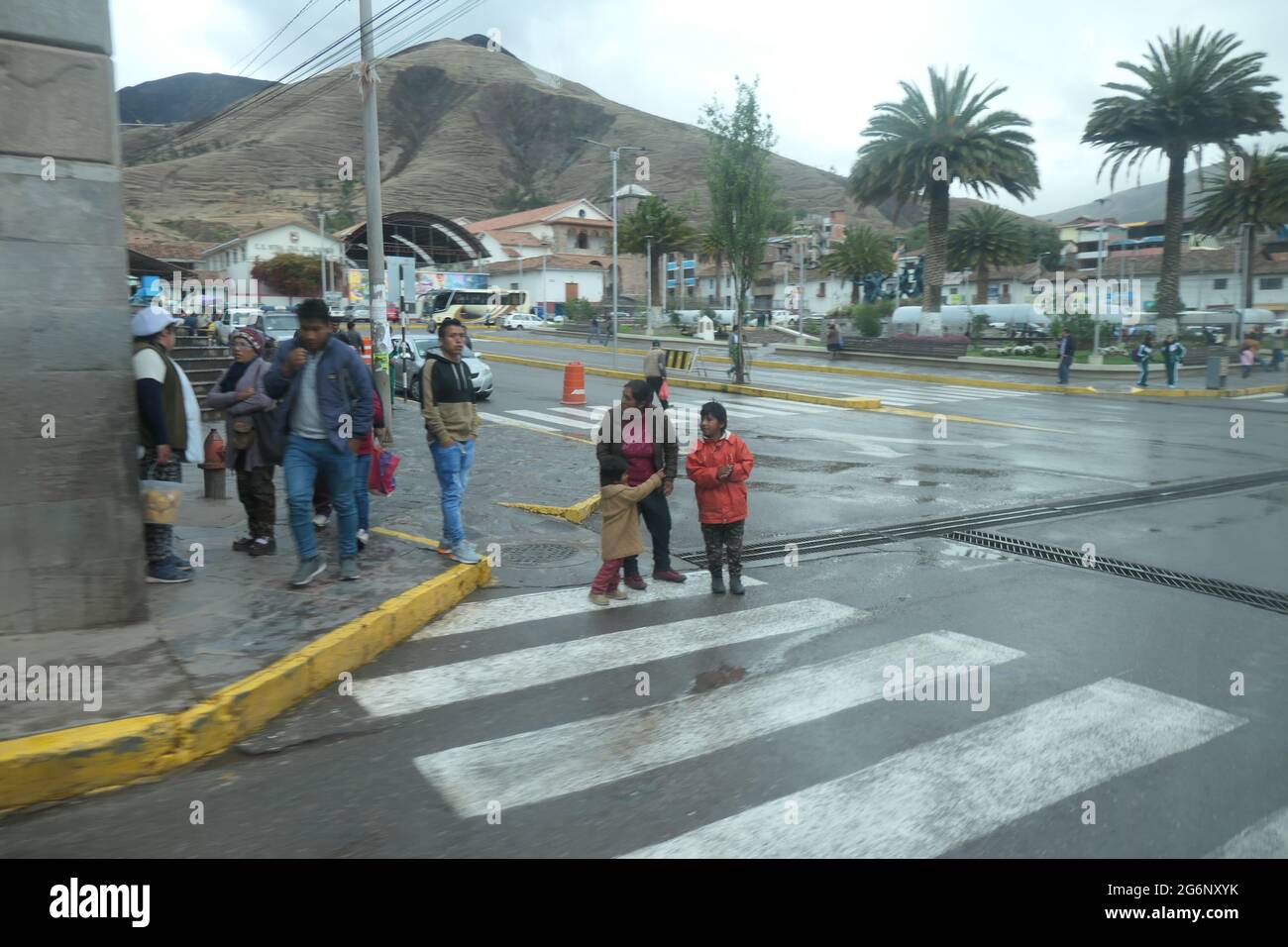 Raining in the Republic of Peru wet trees mountain hill child people ...