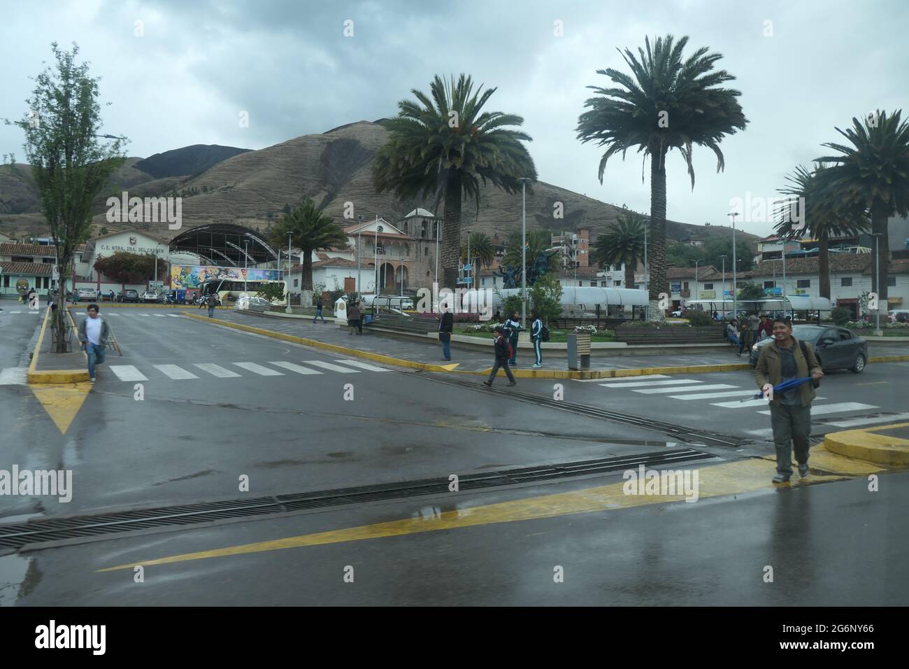 Raining in the Republic of Peru palm trees hills hill zebra crossing ...