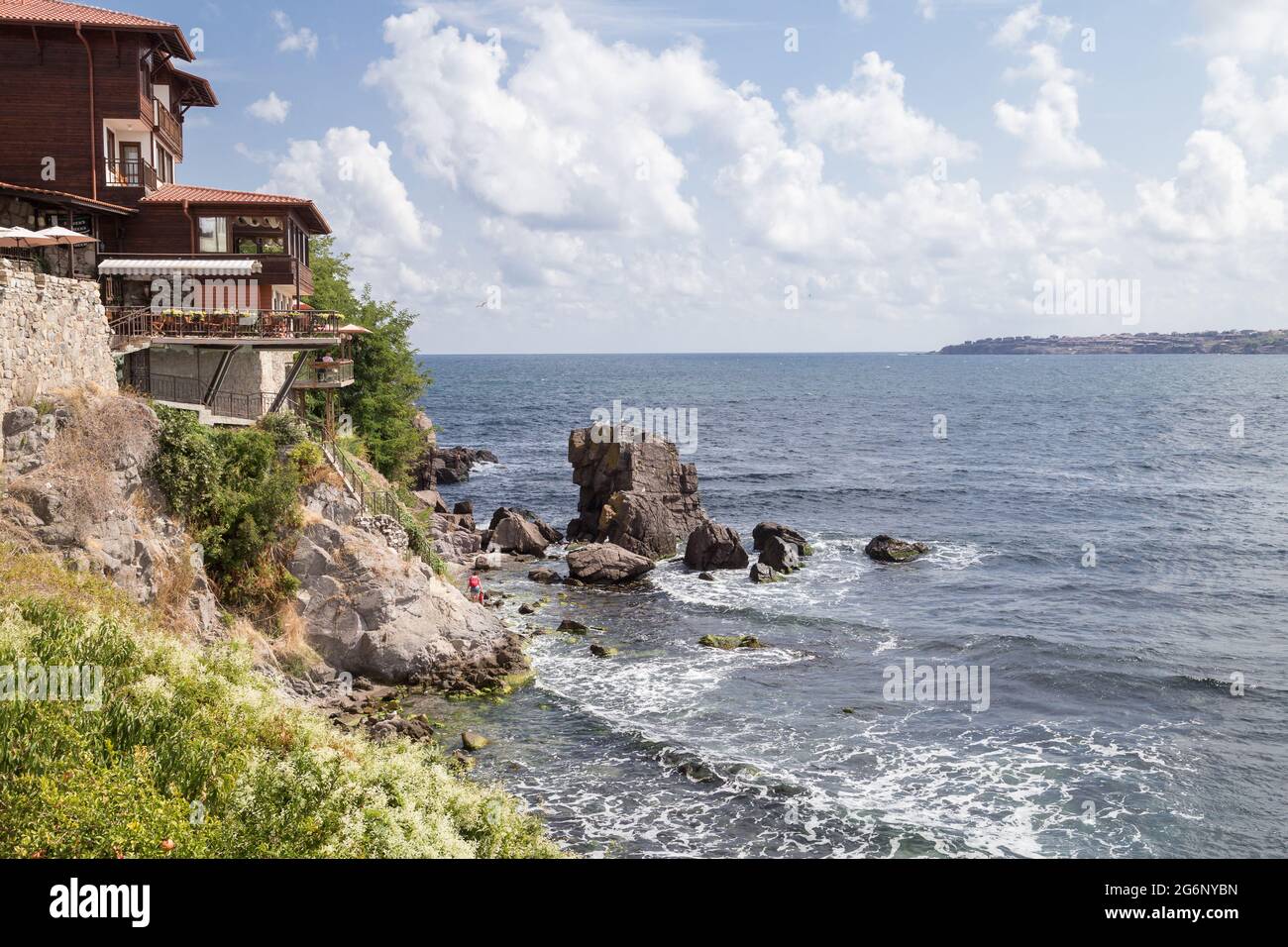 Beautiful seascape with buildings and rocks Stock Photo - Alamy