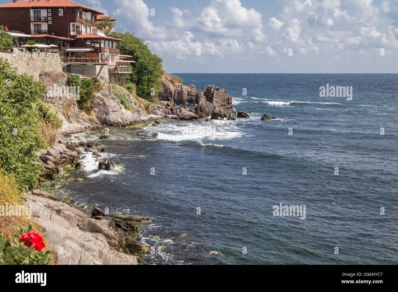 Beautiful seascape with buildings and rocks Stock Photo - Alamy