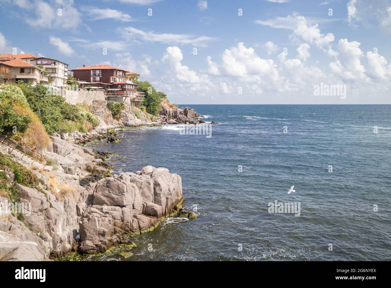 Beautiful seascape with buildings and rocks Stock Photo - Alamy