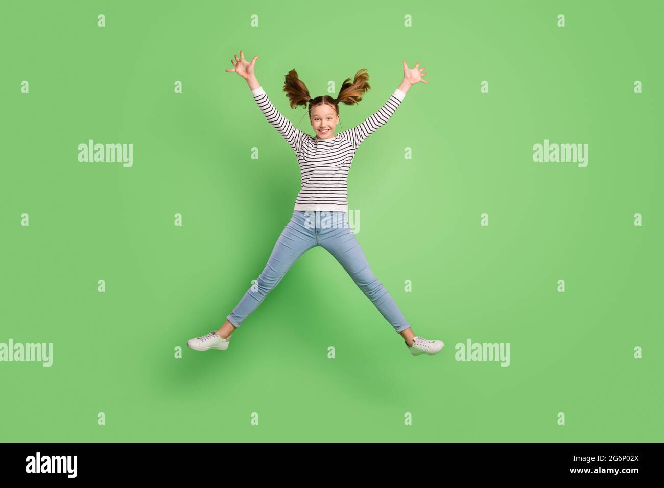Photo of sweet adorable school girl wear white pullover smiling jumping ...