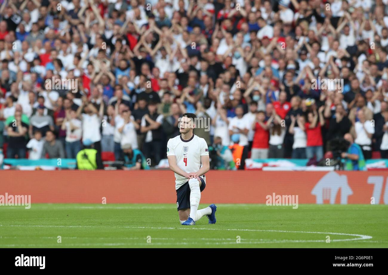 England's Declan Rice takes the knee before the UEFA Euro 2020 semi ...