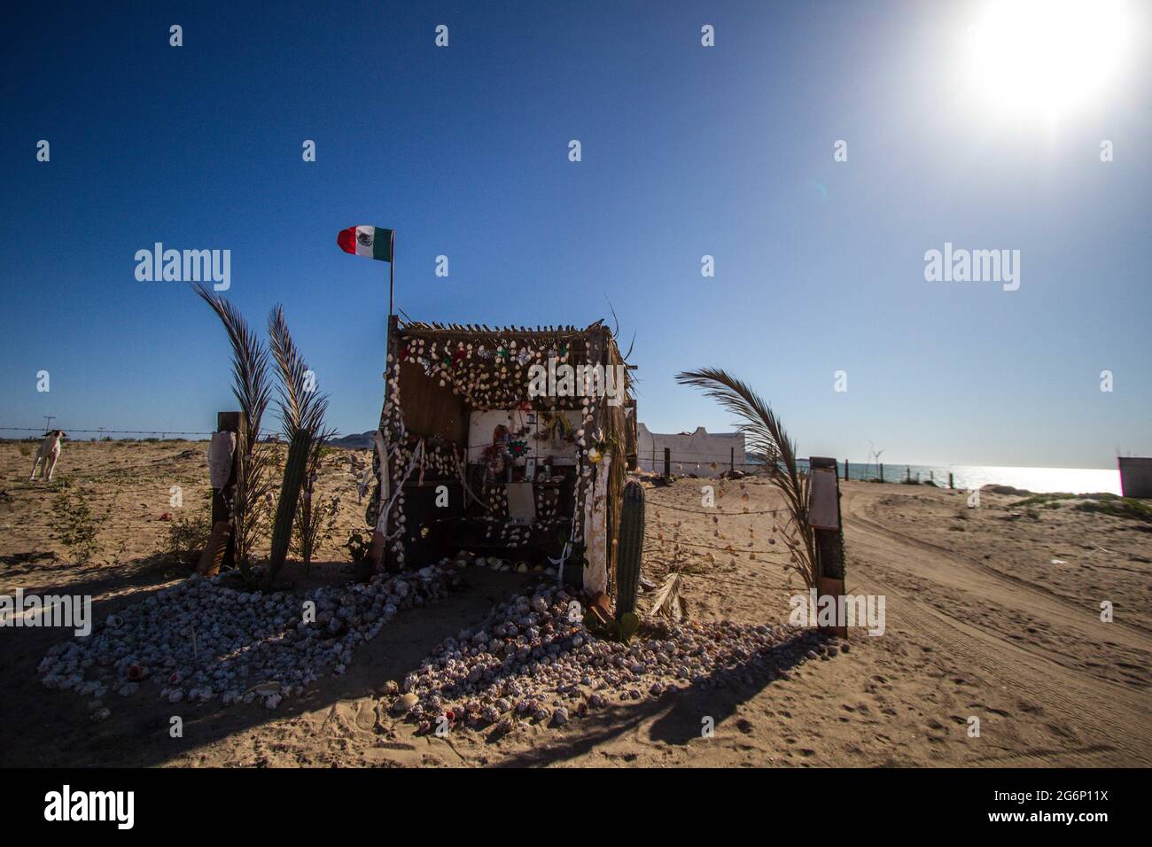 Chapel of saints and flag of Mexico made with seashells, mollusk shells ...