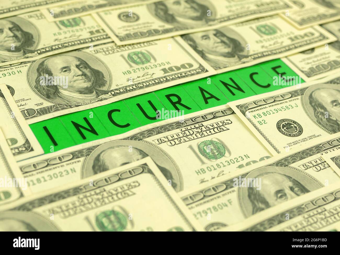 Insurance and US dollar bills on the table, business and economic ...