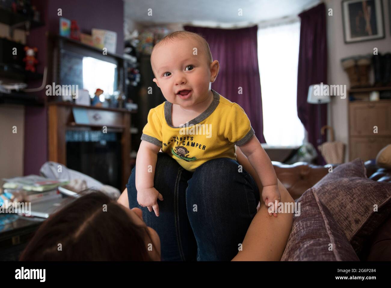 A baby looking straight at the camera Stock Photo - Alamy