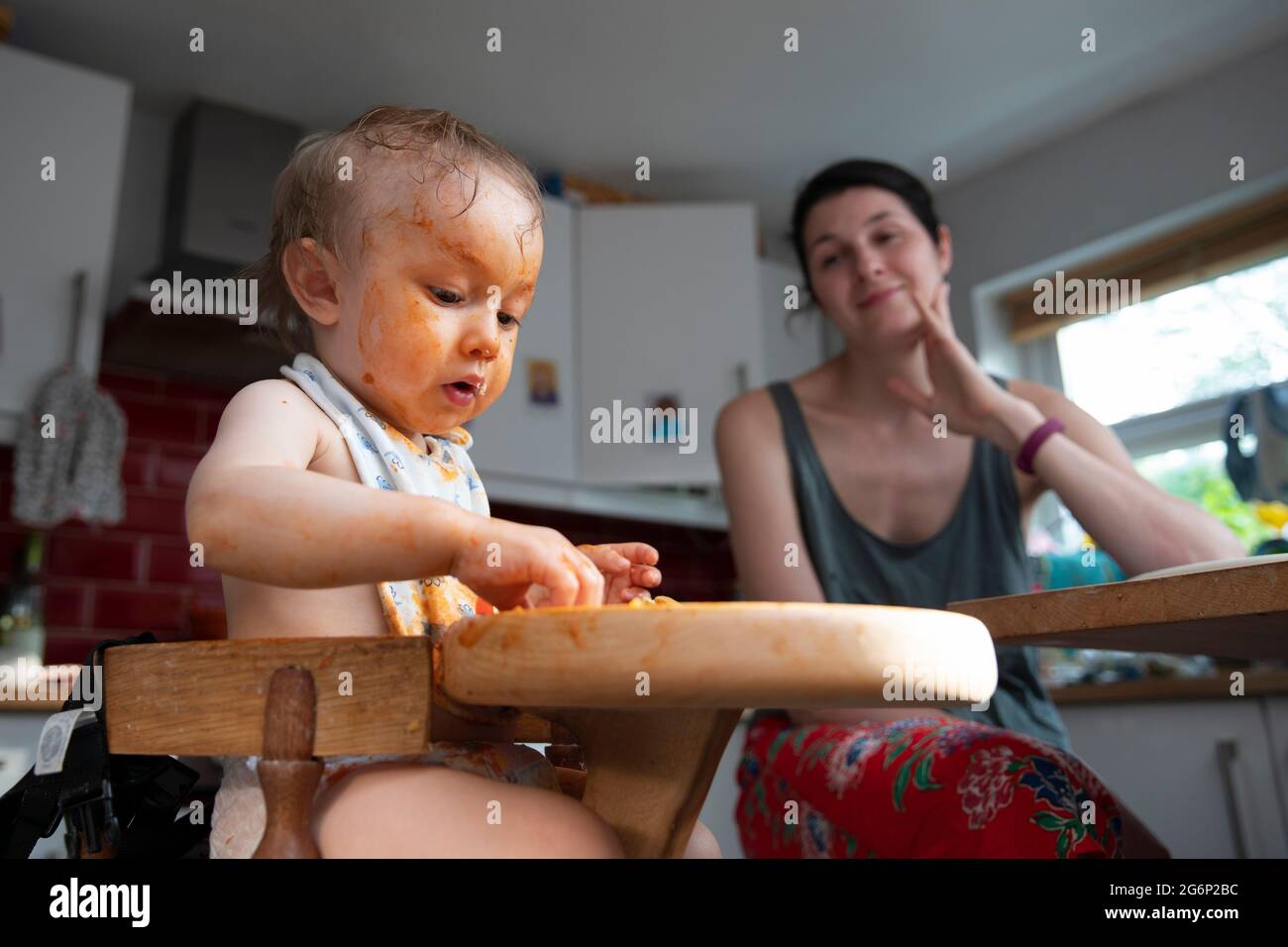Baby eating messily hi-res stock photography and images - Alamy