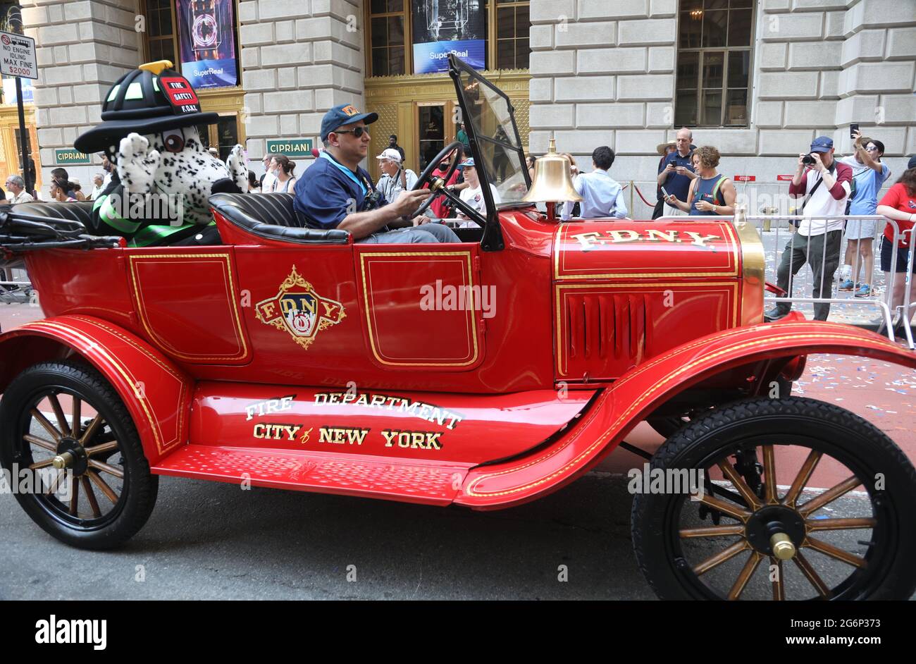 New York, New York, USA. 7th July, 2021. A firefighter and mascot ...