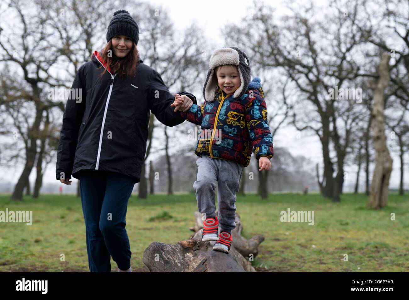 Mother son walk along white hi-res stock photography and images - Alamy